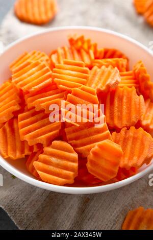 Raw Orange Organic Carrot Chips Cut into Slices Stock Photo - Alamy