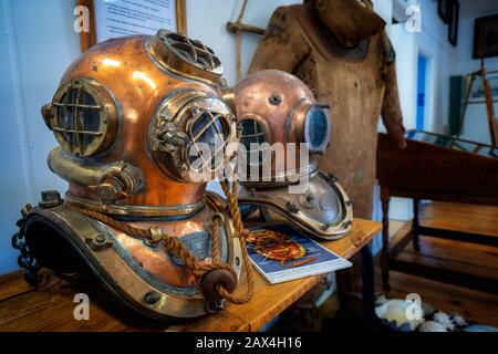 Helmets on display at museum Stock Photo - Alamy