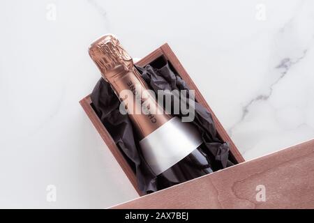 Celebration, drink and branding concept - Champagne bottle and gift box ...