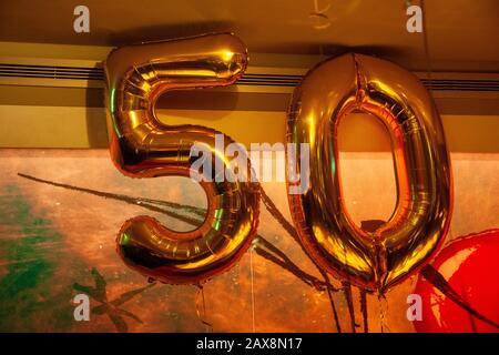 Helium balloons for a 50th birthday Stock Photo - Alamy