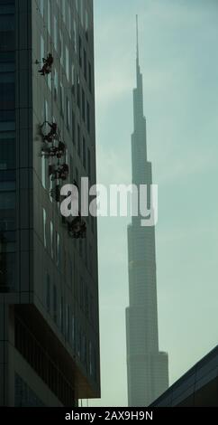Window Cleaners and Burj Khalifa in background, Dubai, United Arab ...