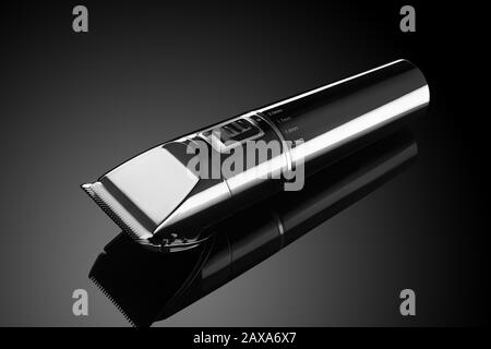 Electrical shaver on a dark background - close up view Stock Photo - Alamy