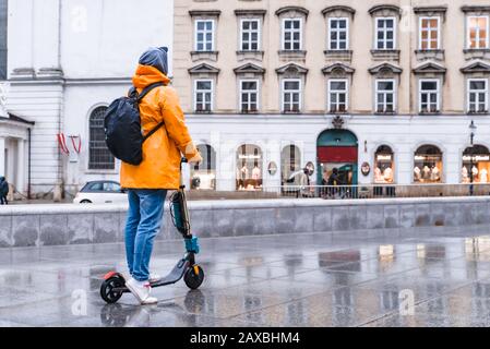 Young man riding a scooter. Vienna, Austria Stock Photo - Alamy