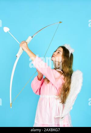 Cupids arrow hit right in heart, arrow of love. Kid cupid hold bow and ...
