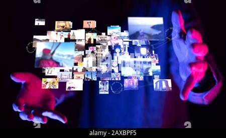 Businessman creating a visual projection of multimedia streaming ...