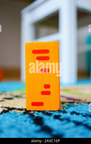 Rectangular toy for children put on a multicolored surface Stock Photo ...