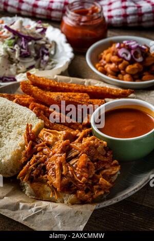 Vegan BBQ sandwich. Barbecue jack-fruit with sweet potato fries ...