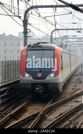 Shanghai metro line 3 approaches a station, Shanghai, China Stock Photo ...
