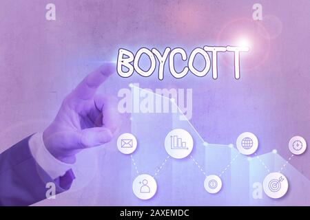 Writing note showing Boycott. Business concept for stop buying or using ...