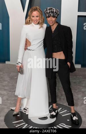 Maria Bello and Dominique Crenn (r) attend the Vanity Fair Oscar Party ...