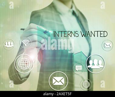 Text sign showing Interns Wanted. Business photo showcasing Looking for ...
