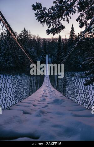 A beautiful view of a path heading to the white buildings of Milos ...