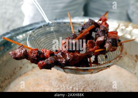 Photo of deep fried beef lungs called locally as Bopis in barbecue ...