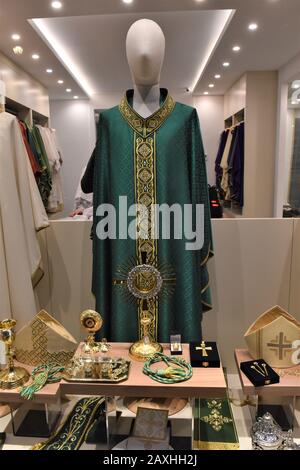 RELIGIOUS CLOTHES AND OBJECTS ON DISPLAY IN A SHOP IN THE HISTORIC ...