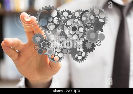 Person presenting the digital projection of engineering gears Stock ...