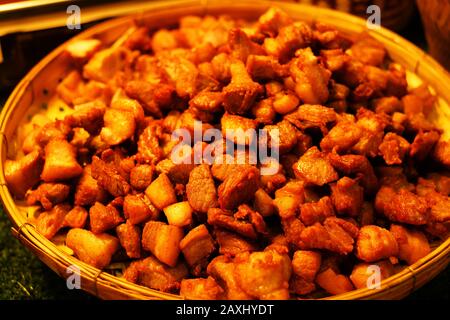 Fried pork on weave basket Stock Photo - Alamy