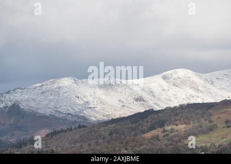 Cumbria, UK. 12th Feb, 2020. UK weather . Snow on fells above the ...
