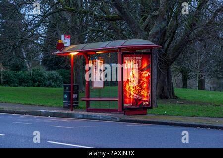 A KFC sign on a bus stop in Palma, Mallorca Stock Photo - Alamy