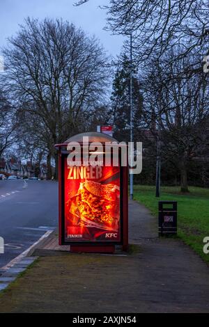 A KFC sign on a bus stop in Palma, Mallorca Stock Photo - Alamy