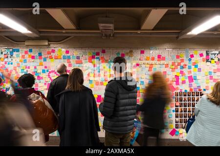 New Yorkers cover the subway station wall in emotional election sticky ...