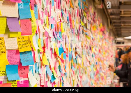 New Yorkers cover the subway station wall in emotional election sticky ...