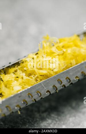 Fresh lemon zest as background, macro view Stock Photo - Alamy