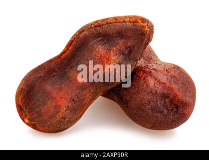 Ripe peeled Tamarind stack on white background. Scientific name ...