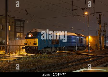 A DB Cargo Class 67 diesel electric locomotive pulling a Great Western ...