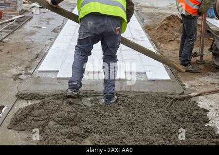 workers makes a new pavement Stock Photo - Alamy