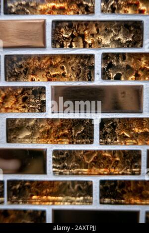 Decorative rust or orange glass bricks on the wall as background Stock ...