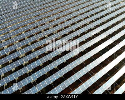 View of arrays of solar panels at a photovoltaic power station in ...
