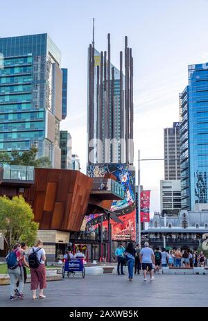 People walking through Yagan Square and Yirin Statue by Tjyllyungoo ...