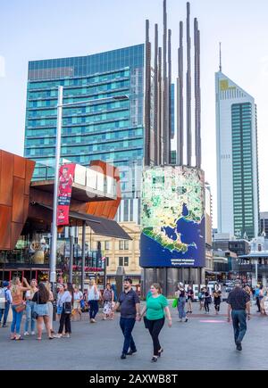 People walking through Yagan Square and Yirin Statue by Tjyllyungoo ...