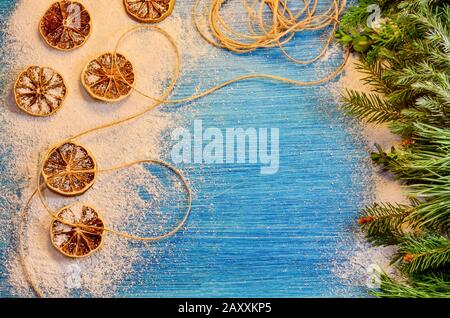 Christmas tree branches cones and nuts. Christmas wooden background ...