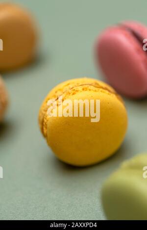 Above view of colorful macaroons on a marble countertop Stock Photo - Alamy