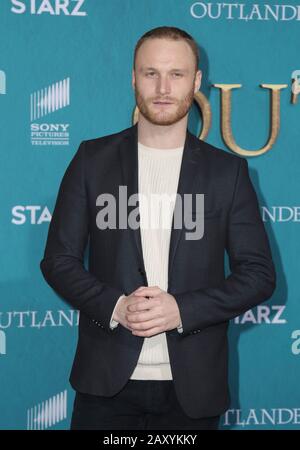 Yan Tual walking the red carpet at the Starz Premiere Event For ...