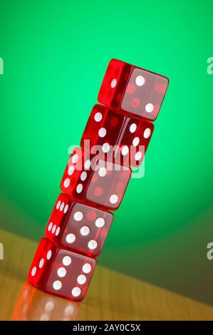 Stack of red casino dice against gradient background Stock Photo - Alamy
