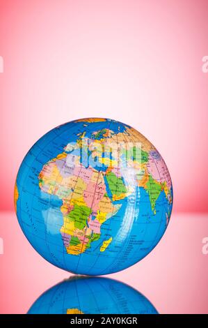 Globalisation concept - globe against gradient colorful background ...