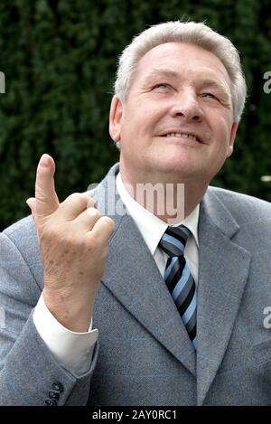 Older German man in a suit and tie Stock Photo - Alamy