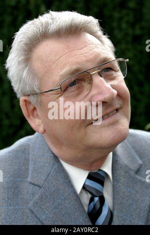 Older German man in a suit and tie Stock Photo - Alamy