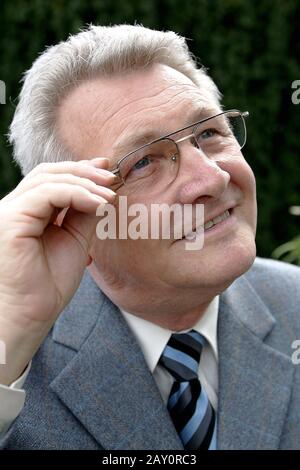 Older German man in a suit and tie Stock Photo - Alamy