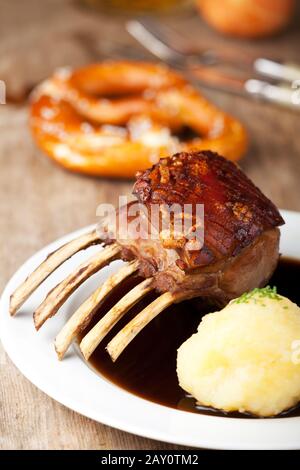 Roast suckling pig with dumplings Stock Photo - Alamy