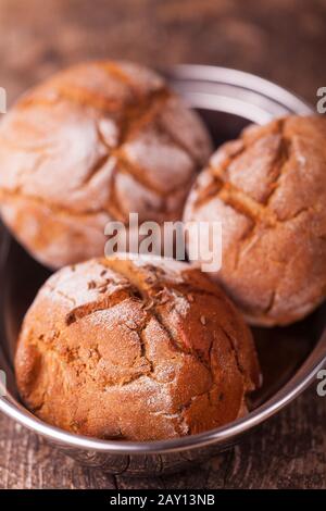 three rye rolls on wood Stock Photo - Alamy