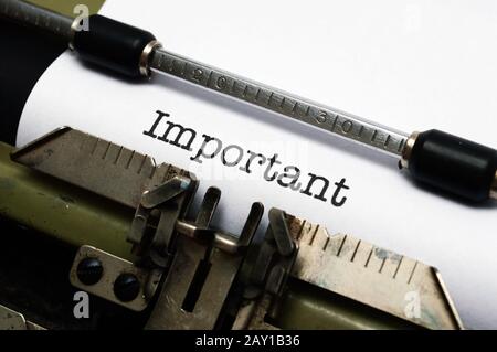 Important text on typewriter Stock Photo - Alamy