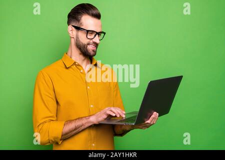 Profile portrait of cheerful intelligent guy operation server debugging ...