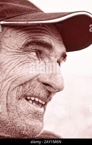 An old man with a grey beard Stock Photo - Alamy