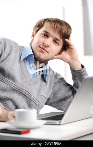 relaxed young Business man at office Stock Photo - Alamy