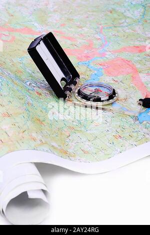 Maps, compass, gps and equipment isolated in white Stock Photo - Alamy