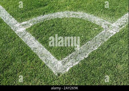 green field in soccer stadium . ready for game in the midfield. View ...