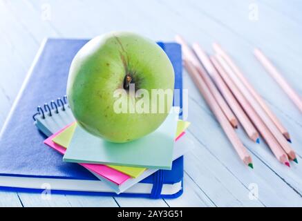 black chalk drawing frame and stack of books, gray background , back to ...